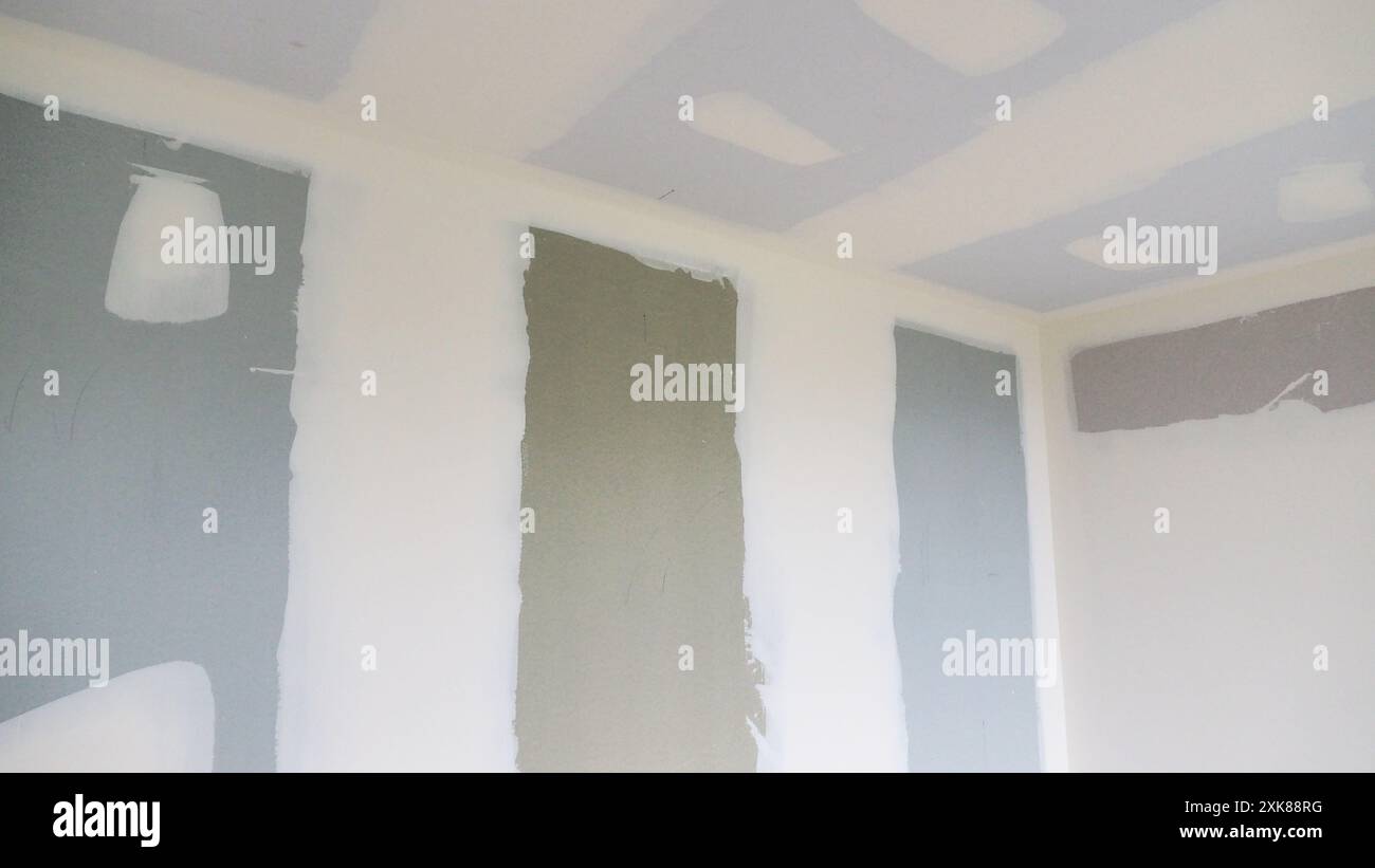Plaster work newly done on walls and ceiling Stock Photo - Alamy