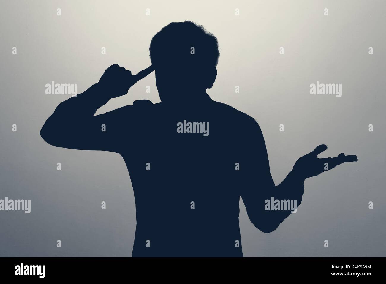 Finger against temple hi-res stock photography and images - Alamy