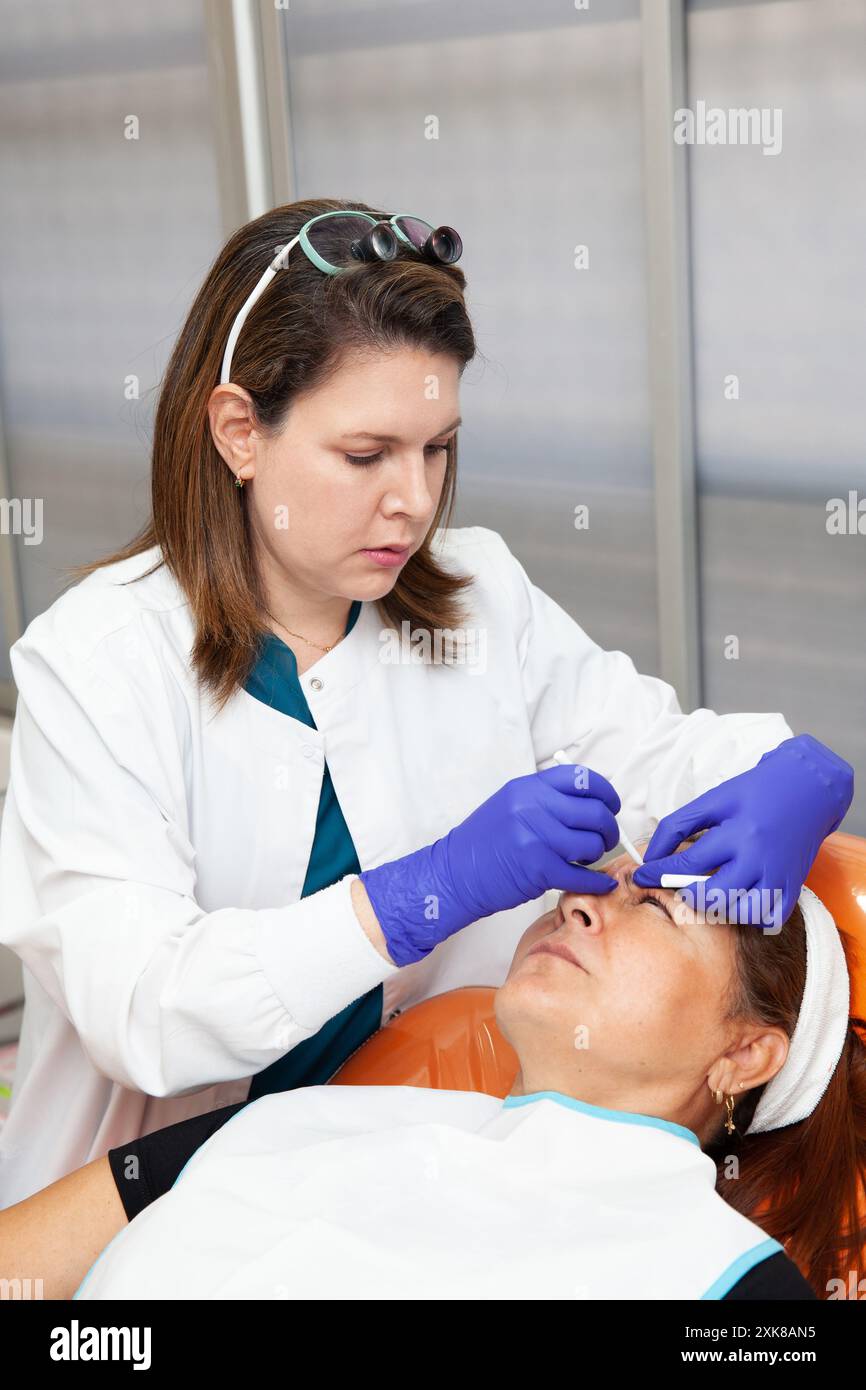 Dermatologist marking of injection points for botulinum toxin ...