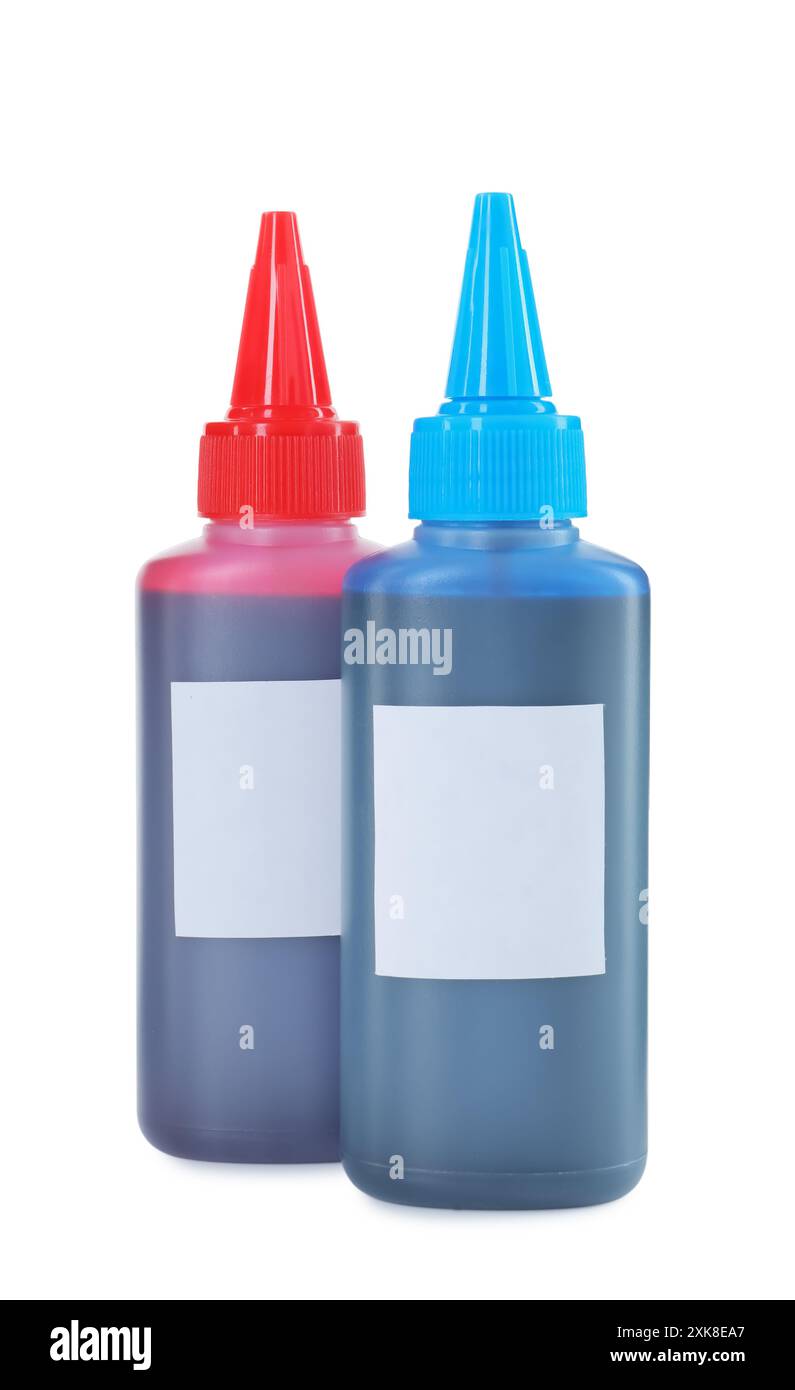 Bottles of different printer ink isolated on white Stock Photo - Alamy