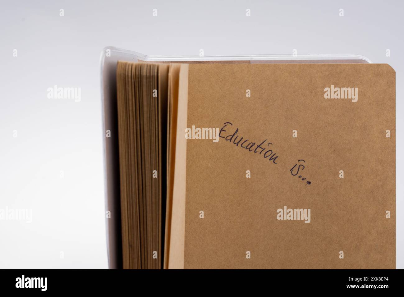 Student holding notebook written hi-res stock photography and images ...