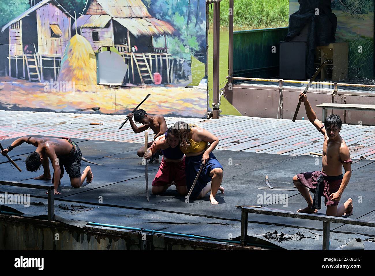 Stage actors depicting the hardship faced by the women of Bang Rachan ...