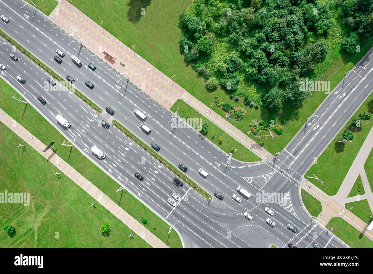 road intersection during rush hour with traffic on road. aerial top ...