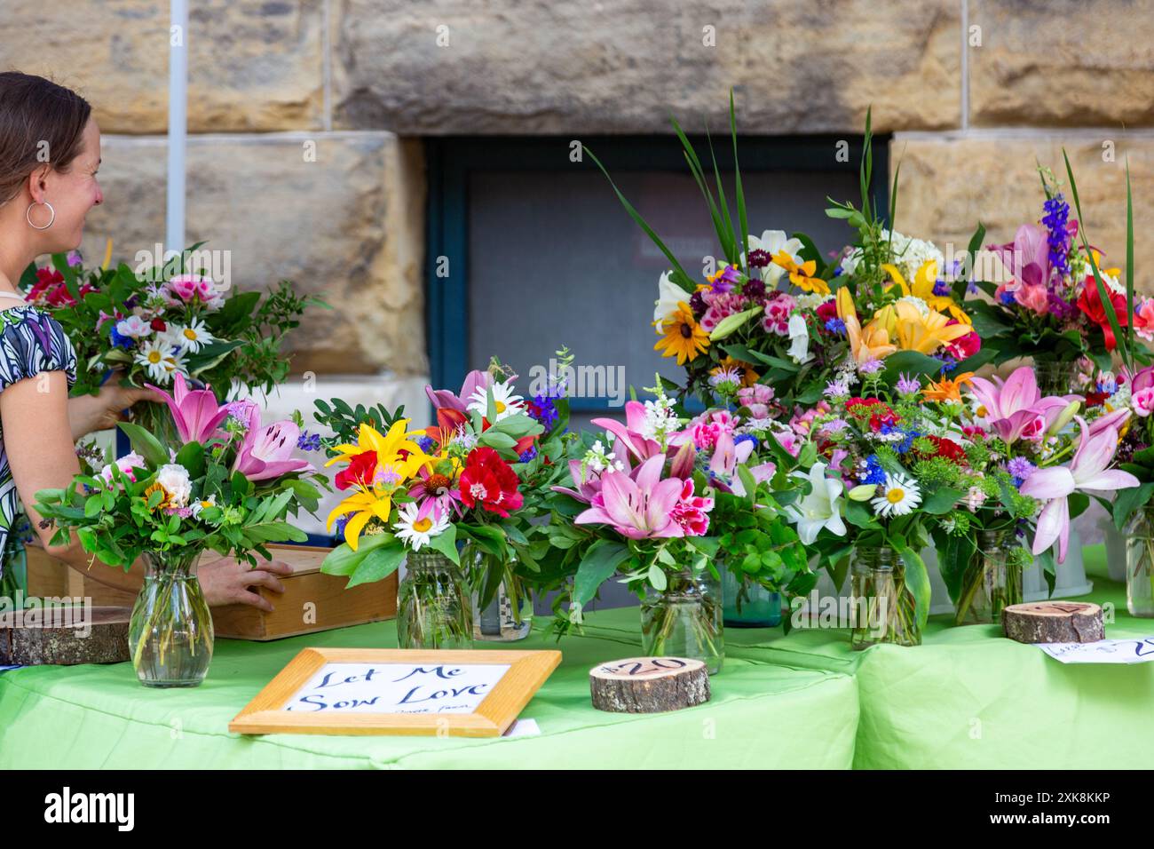 Let Me Sow Love flower arrangements on display at the YLNI Farmers ...