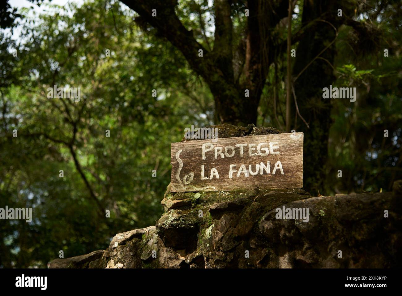 Signboard on the edge of a rural trail frequented by tourists with the ...