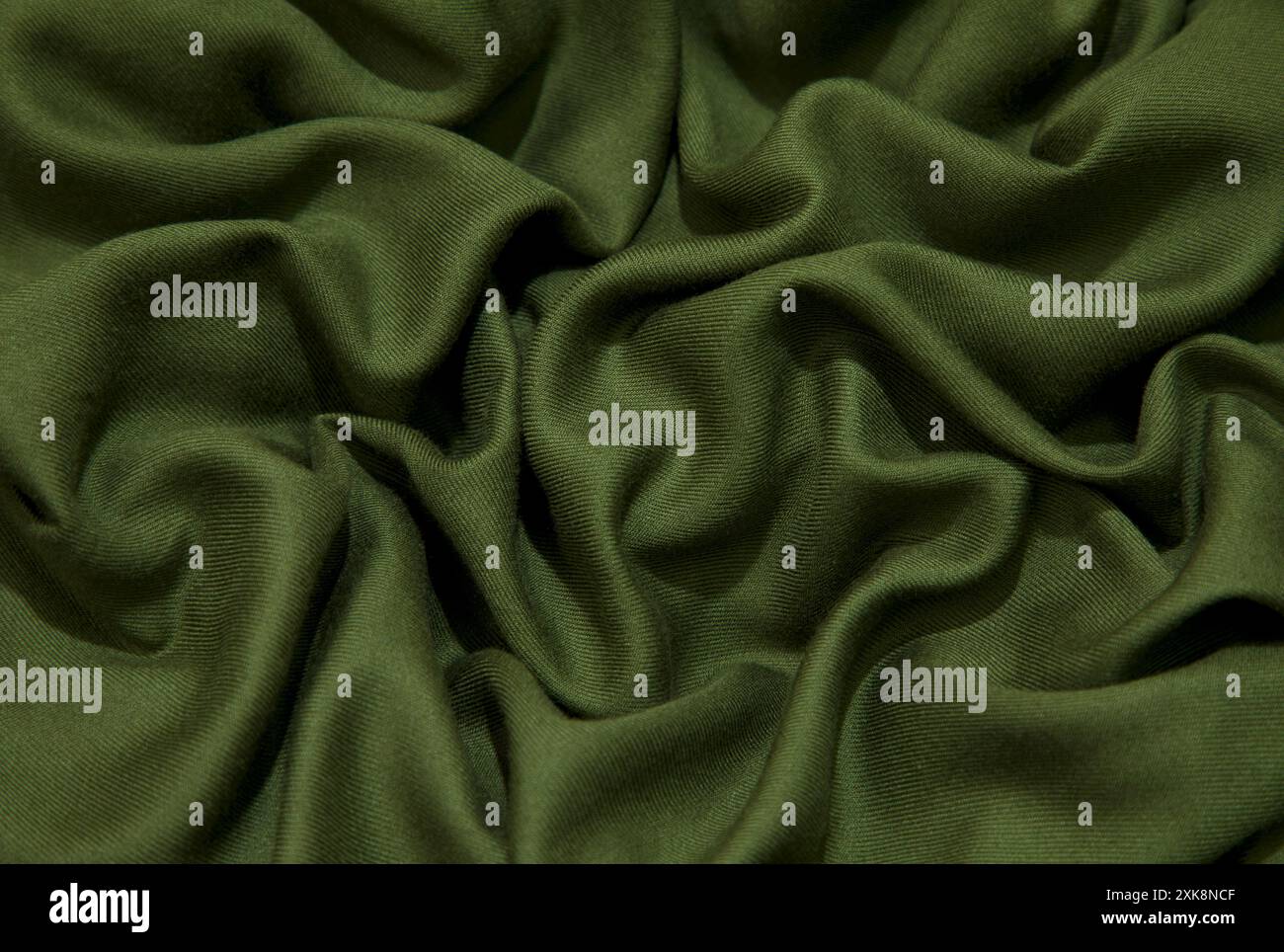 Green fabric background. Green cloth waves background texture. Green fabric cloth textile ...
