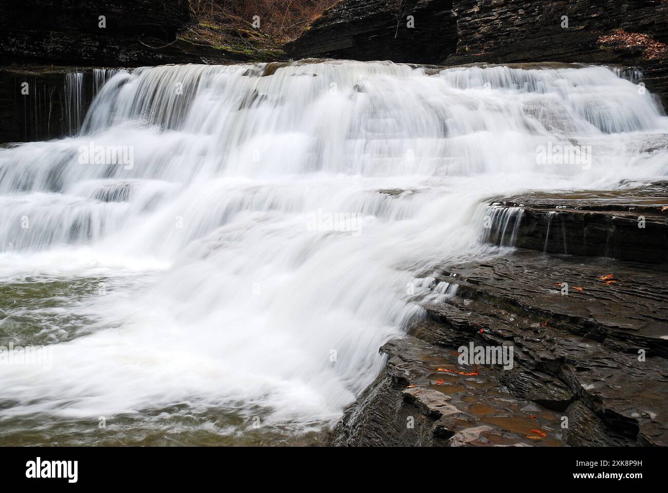 The rushing waters of the Robert H Treman Falls in Ithaca, in the Finger Lakes Region of New ...