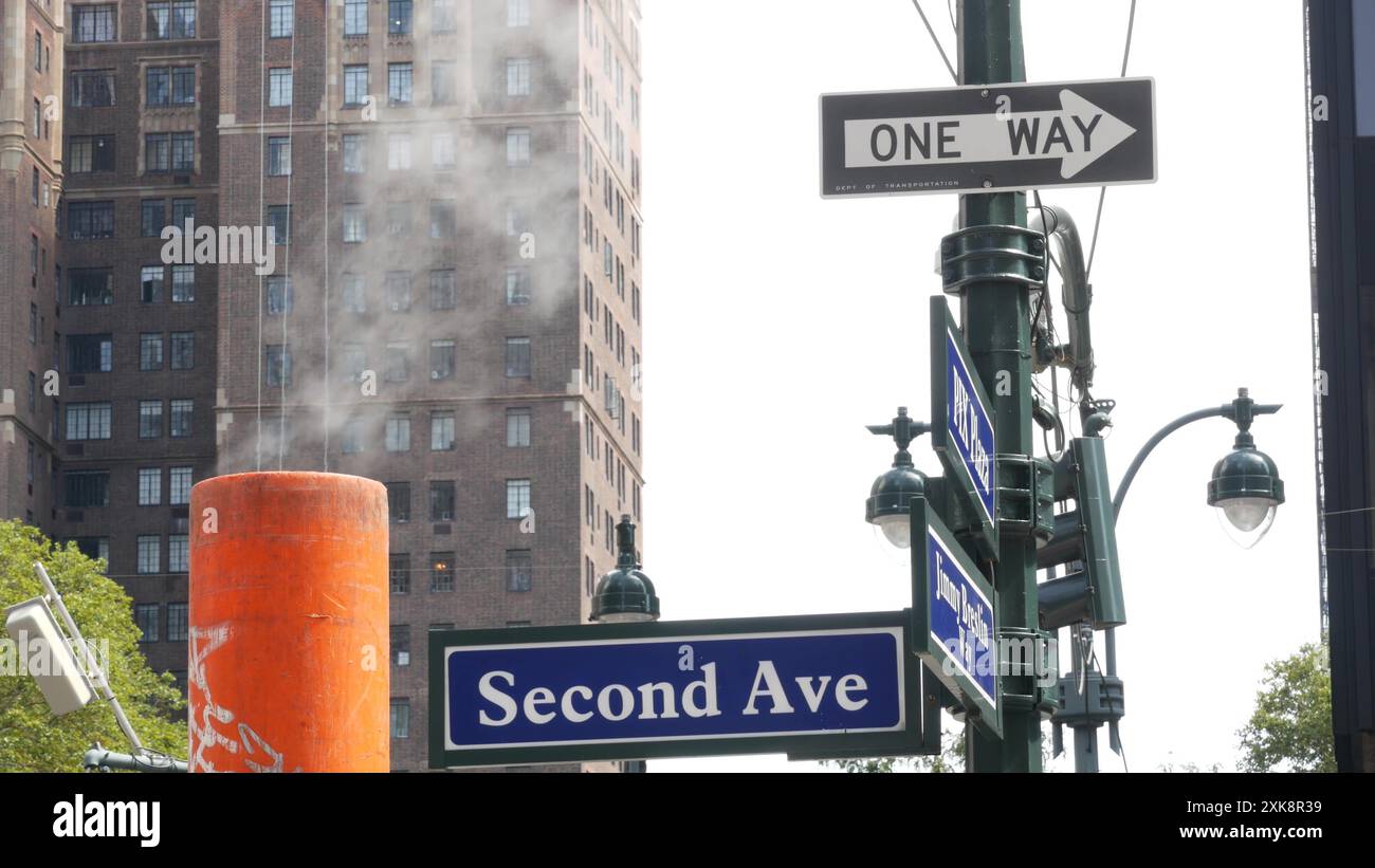 Steam vapor vented, New York City 42 street, orange vapour tube stack ...