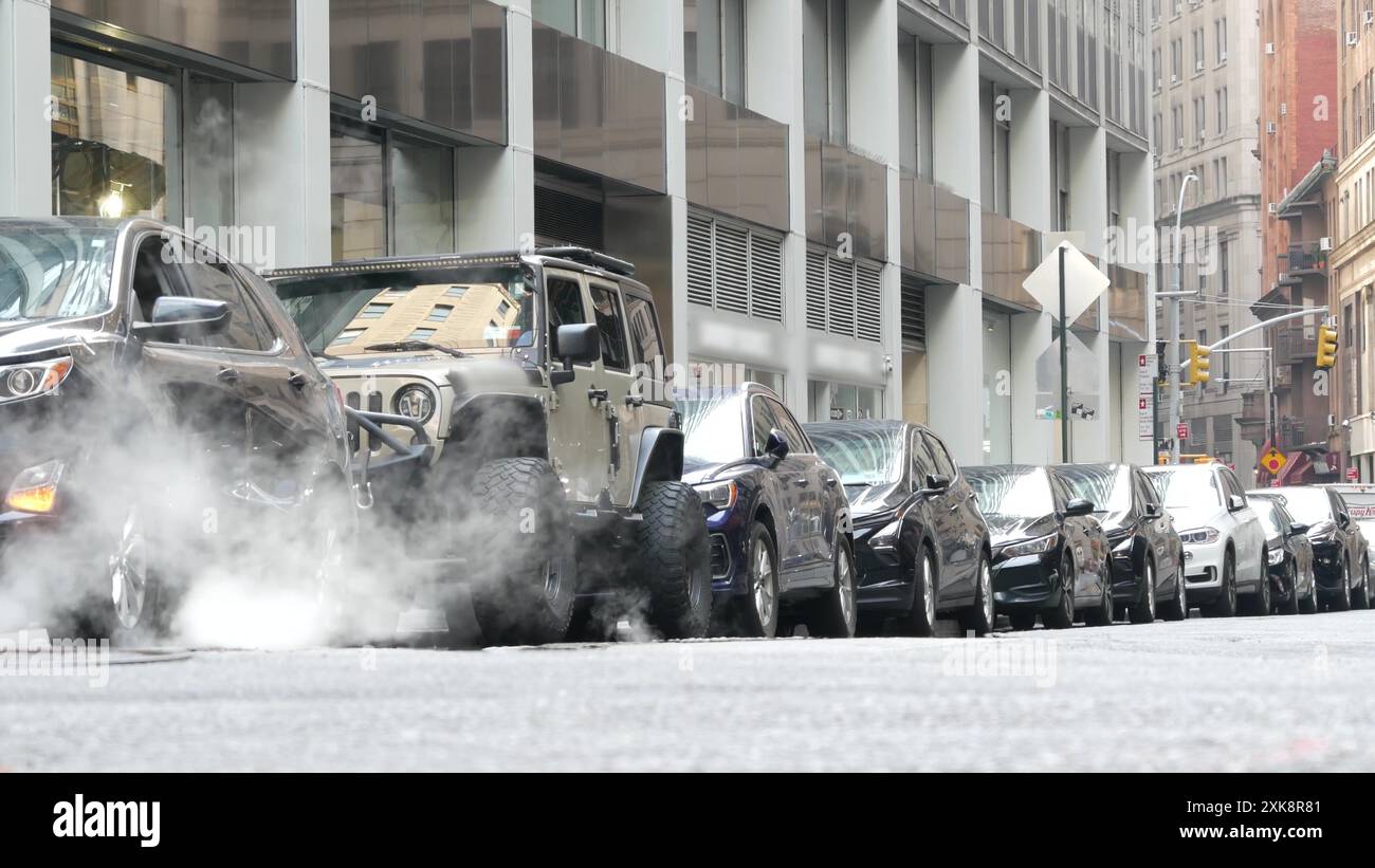 Hot smoke from manhole, Con Edison's Steam system in New York City ...