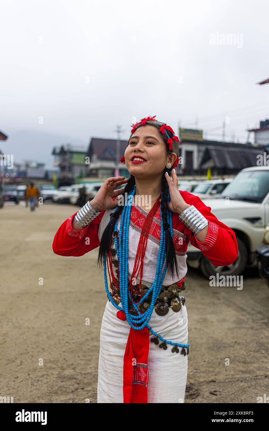 A Nyishi woman in traditional attire and jewelry, celebrating the ...