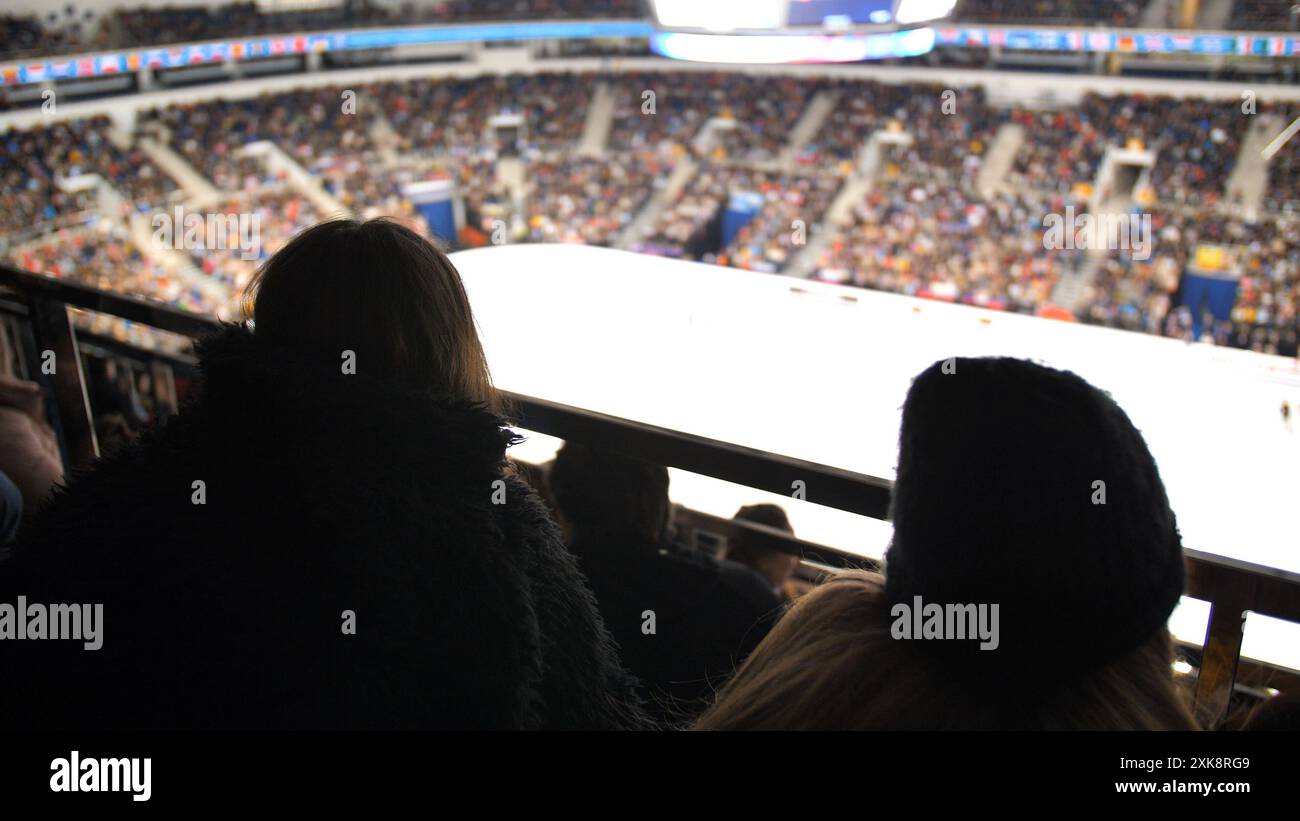 Fans sit on the ice arena during the World Cup in figure skating Stock ...