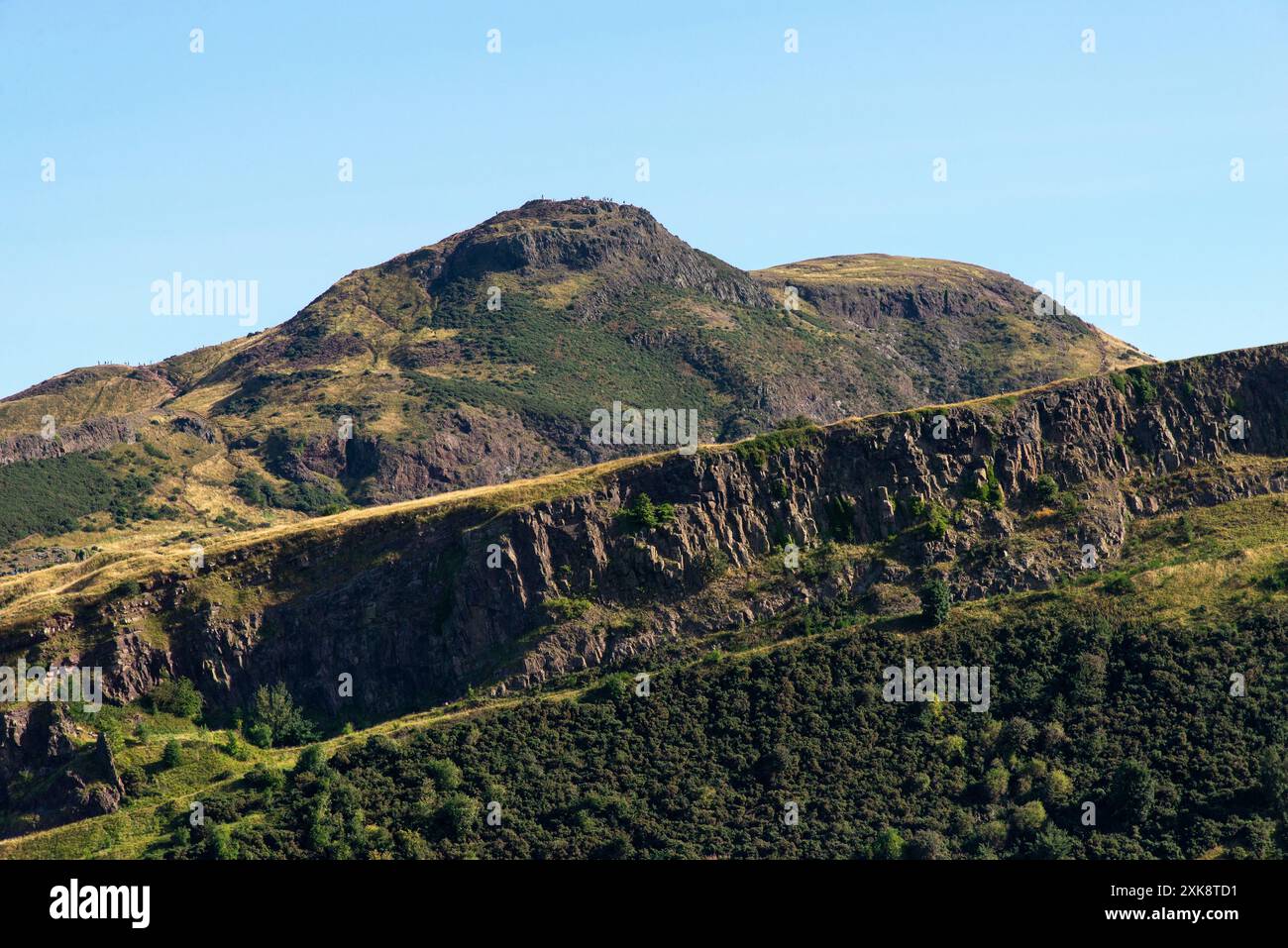 The extinct volcano known as Arthur's Seat, along with Salisbury Crags ...