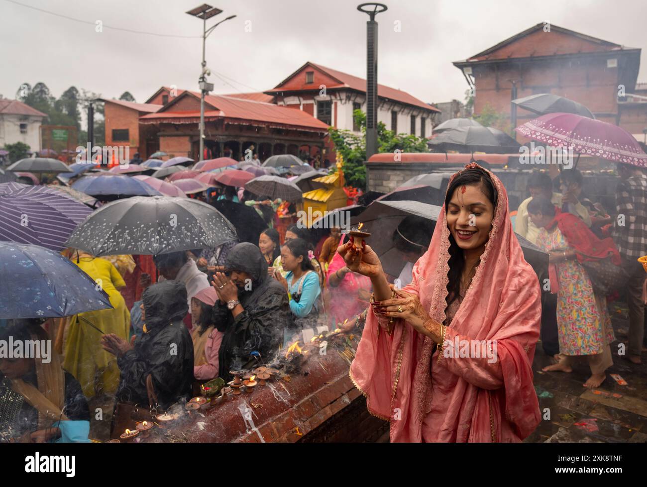 Hindu devotees offer prayers during the holy month of Shrawan, fourth ...