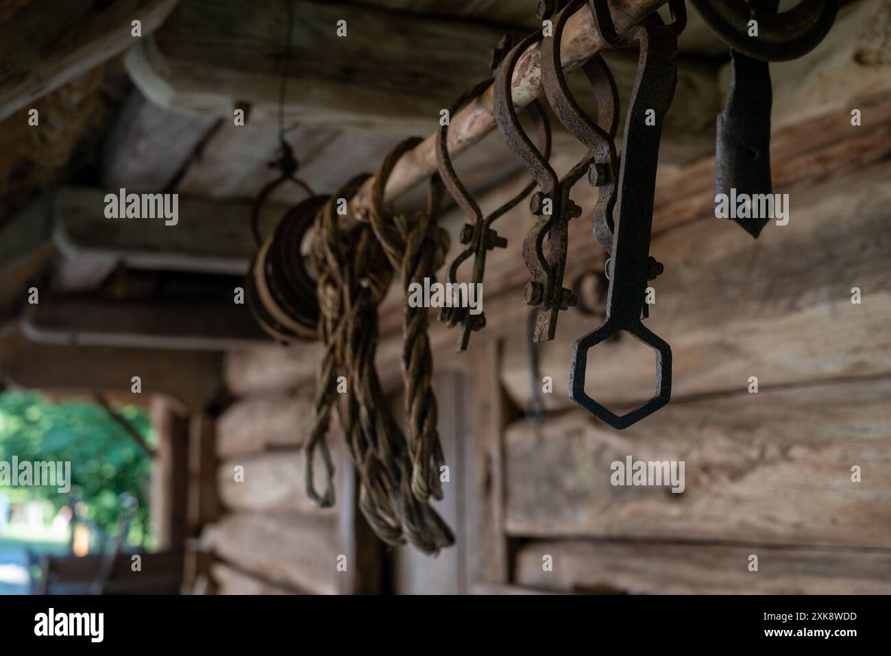 old simple tools outside an antique stable in the countryside Stock ...