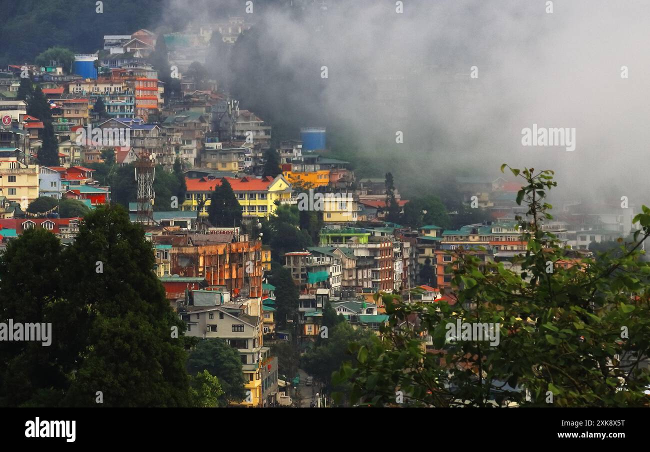 clouds are floating over beautiful darjeeling hill station in monsoon ...