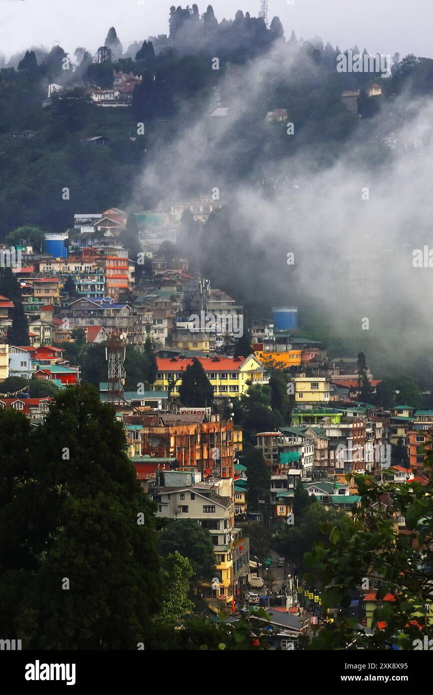 clouds are floating over beautiful darjeeling hill station in monsoon ...