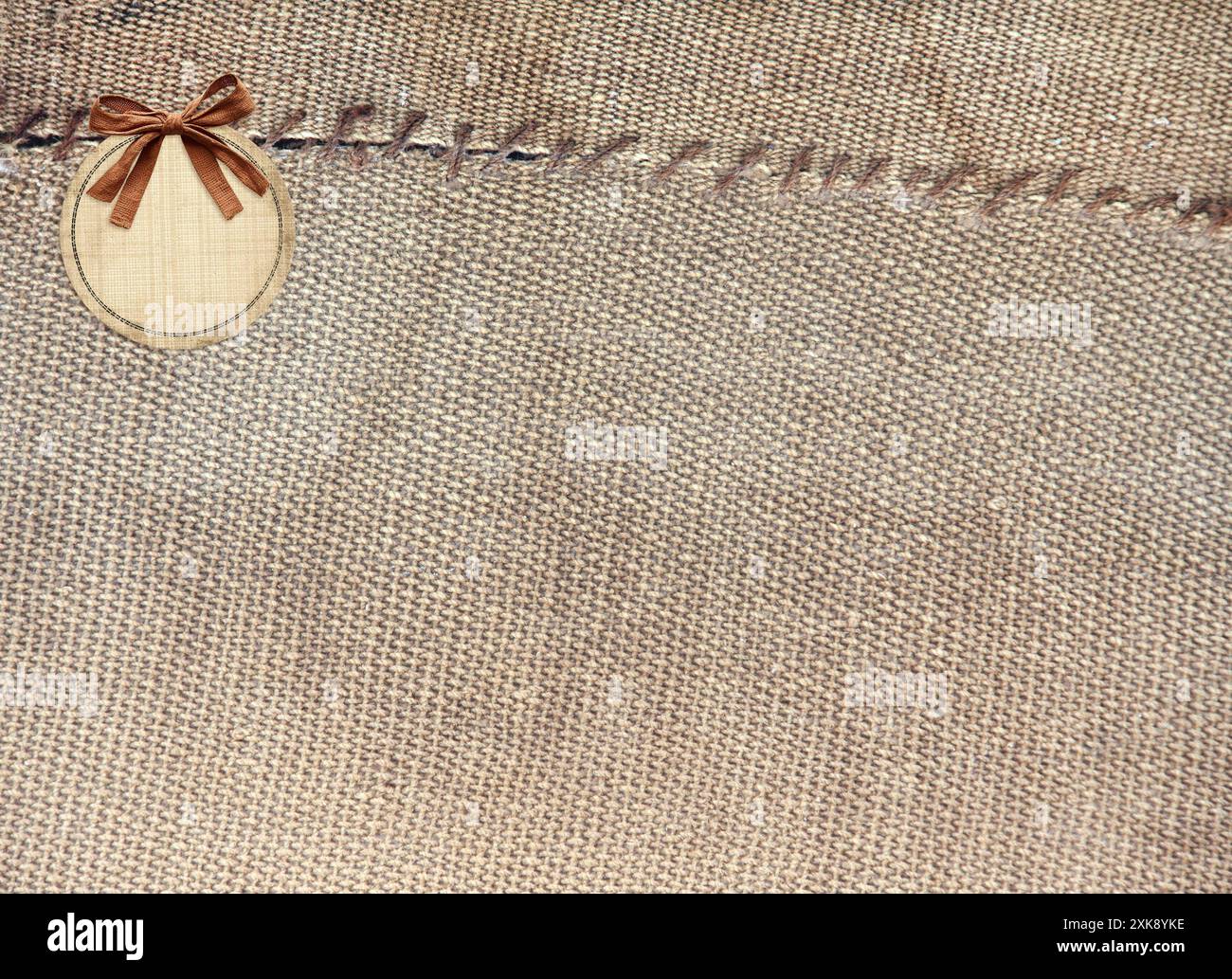 Two pieces of old burlap sewn together with thread. Horizontal ...