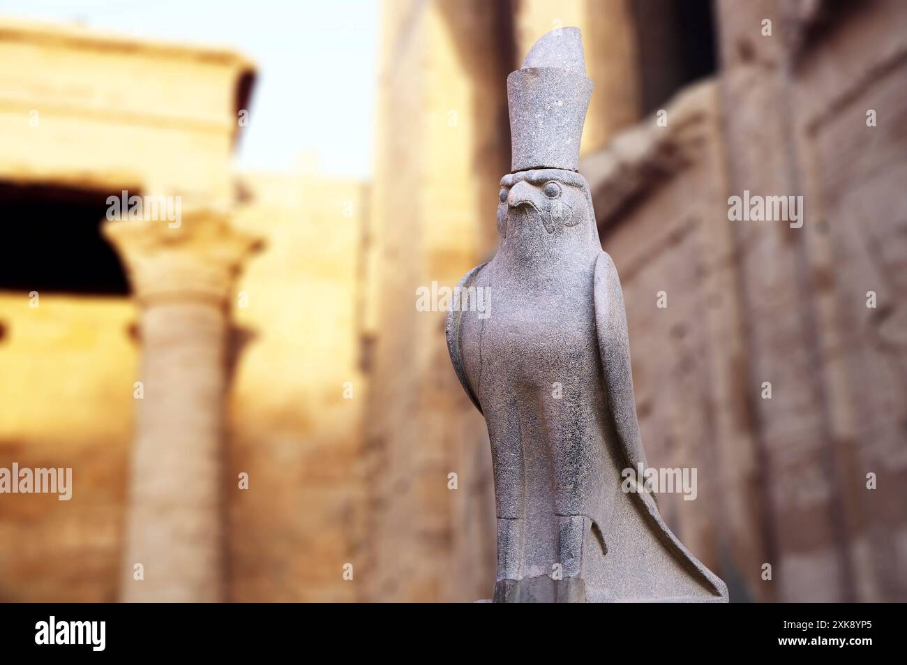 Granite statue of God Horus falcon at entrance Temple of Horus, Edfu ...