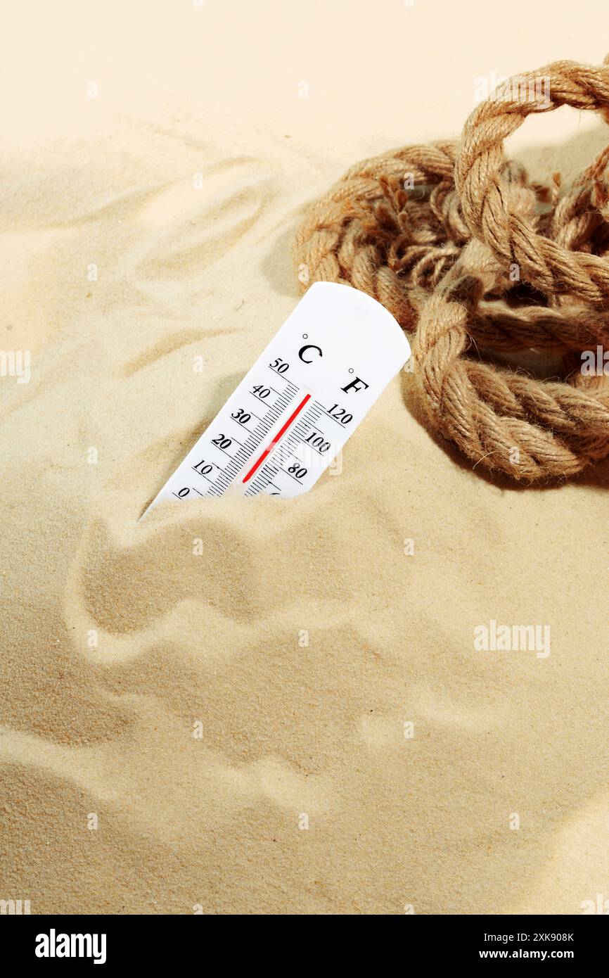 Thermometer In Sand With Rope Showing Hot Summer Day Temperature Stock ...