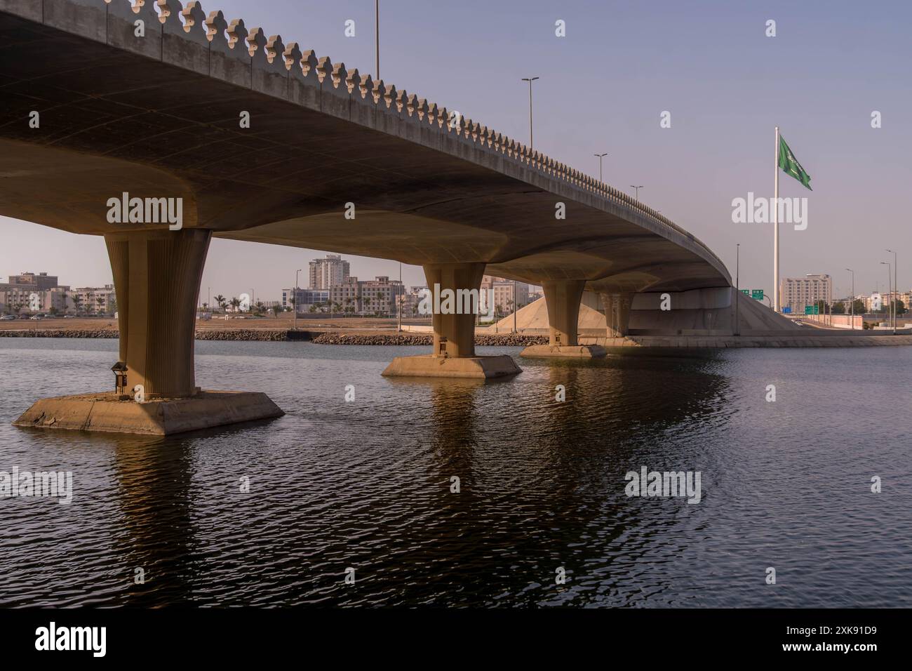 The large Saudi Arabia flag and the bridge across the Jeddah harbor in ...