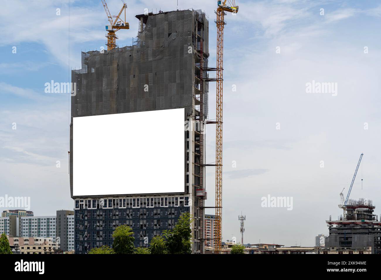 Blank white banner for advertisement hanging on the scaffolding of ...