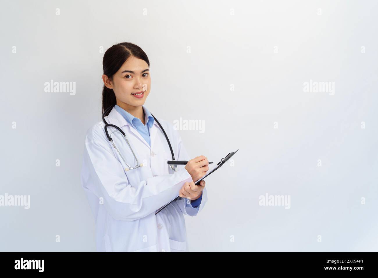 Concept of doctor and medical. Asian female Doctor hand taking note ...