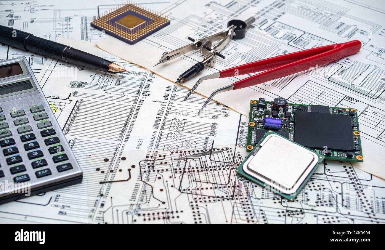 Electronic components and tools on an engineering blueprint for circuit ...