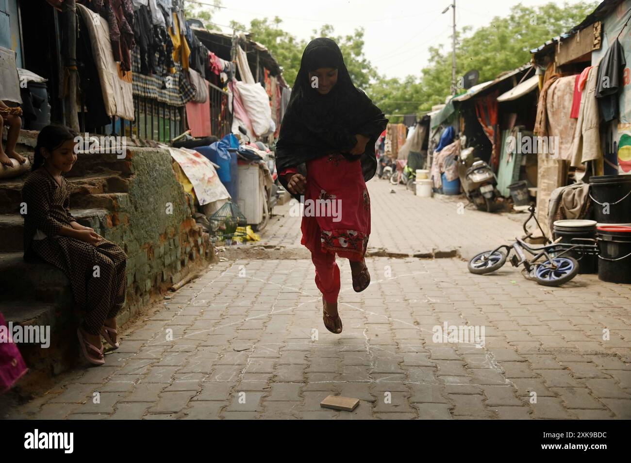 Delhi, New Delhi, India. 22nd July, 2024. kIds living in slum area ...