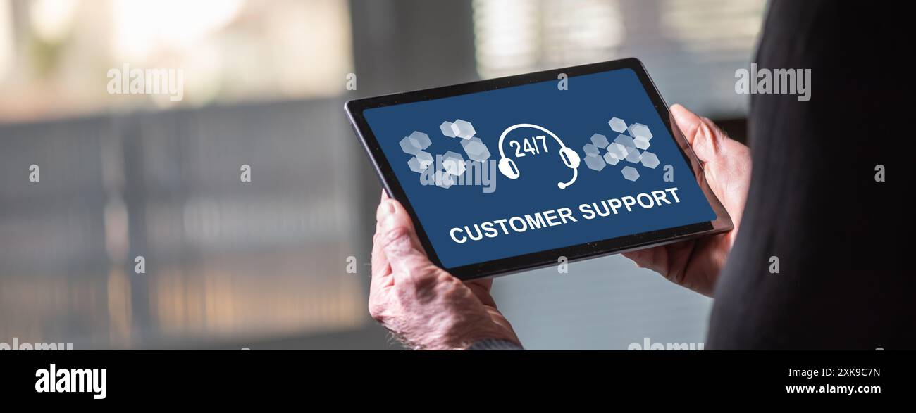 Tablet screen displaying a customer support concept Stock Photo - Alamy