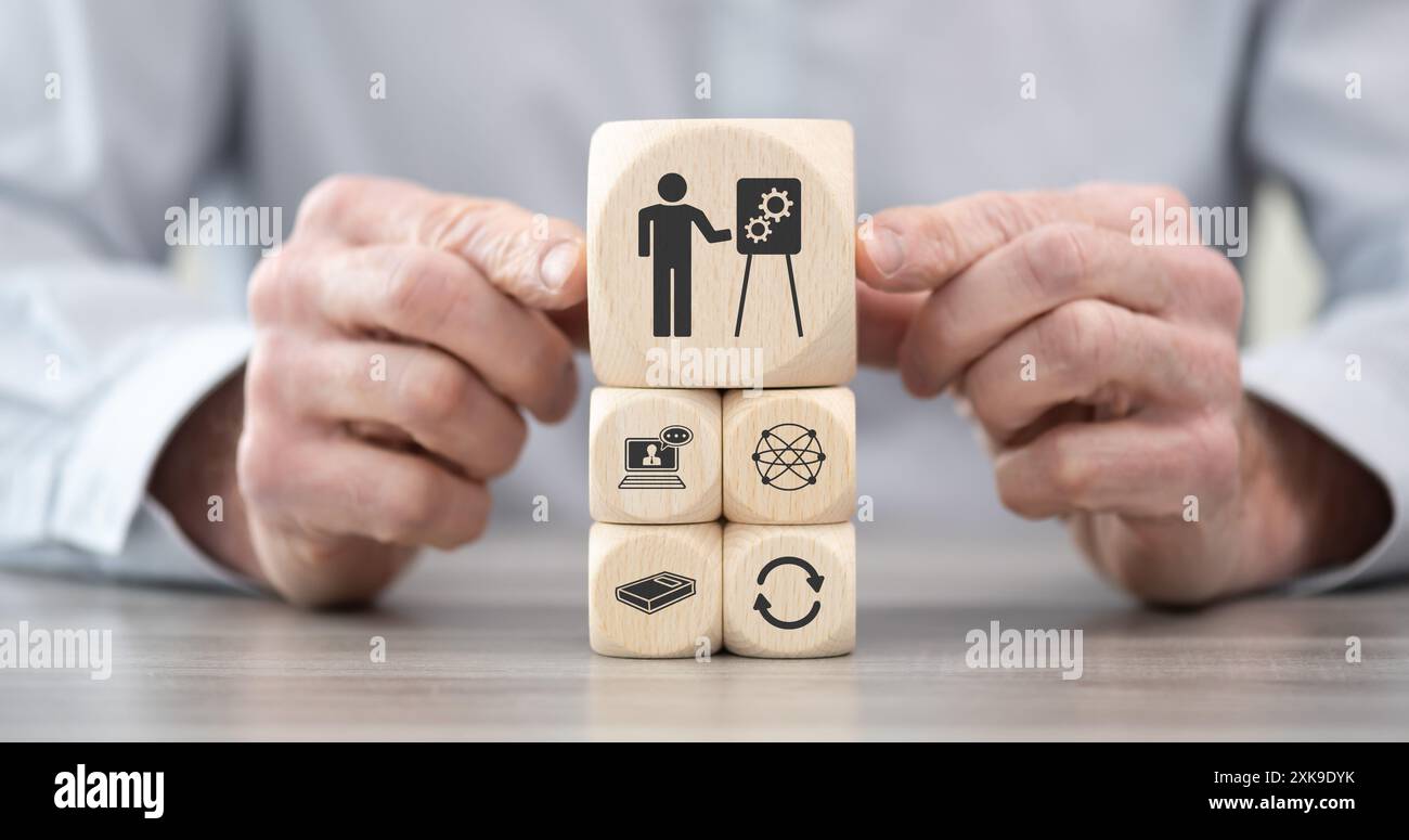 Wooden blocks with symbol of training concept Stock Photo - Alamy