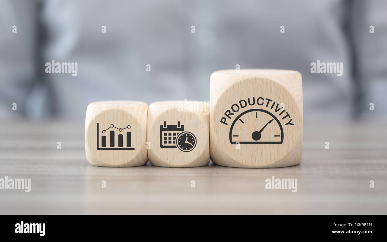 Wooden blocks with symbol of productivity concept Stock Photo - Alamy
