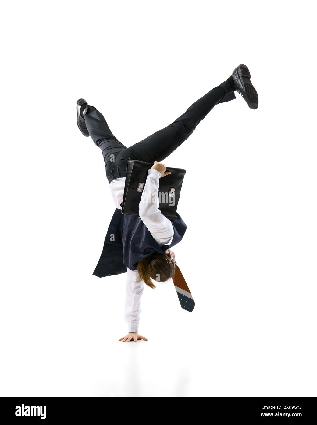 In suit and tie, breakdancer executes stunning handstand, effortlessly ...
