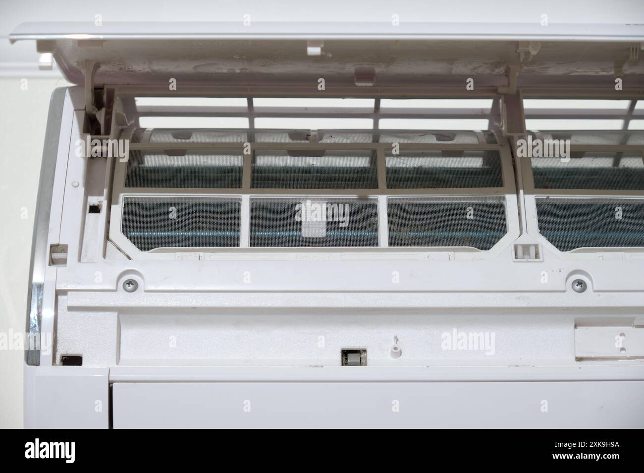 Open air conditioner cover, cleaning air conditioner filters from dirt ...