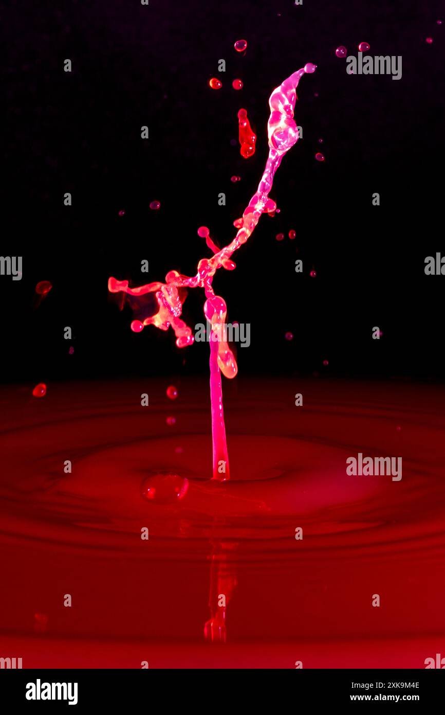 Beautiful splash art water droplet photography in a blood red colour ...