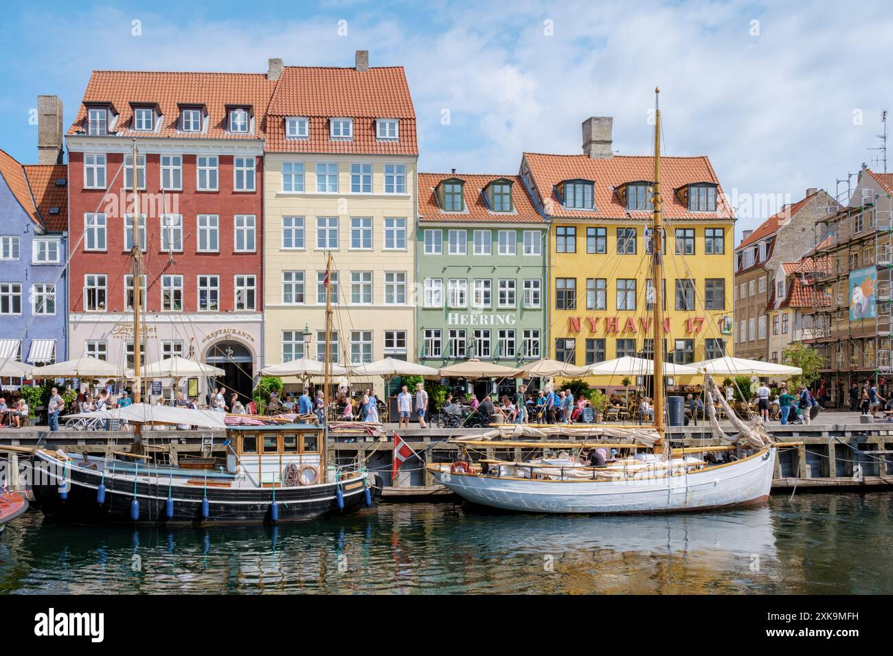 Copenhagen Denmark 21 July 2024, A charming scene of boats docked along ...