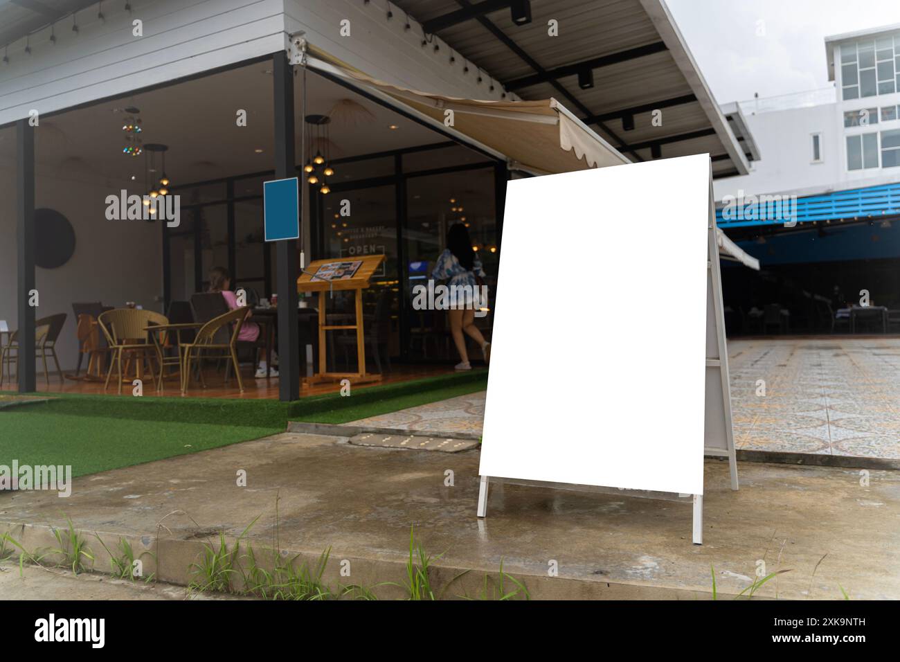 White paper poster mockup displayed outside the building. Marketing and ...