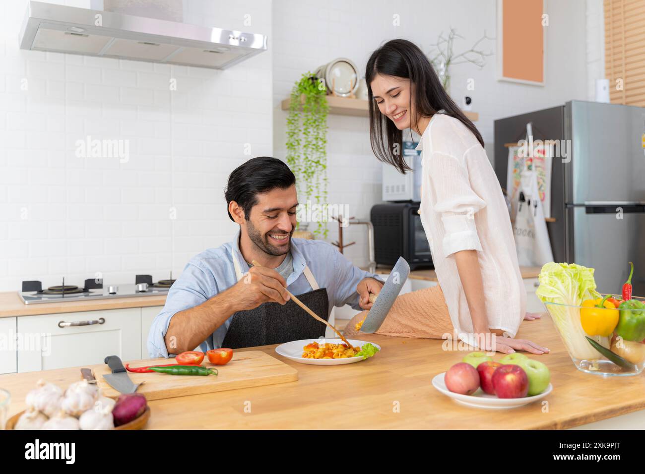 Two passionate lovers look gentle. The couple prepares Valentine's Day ...