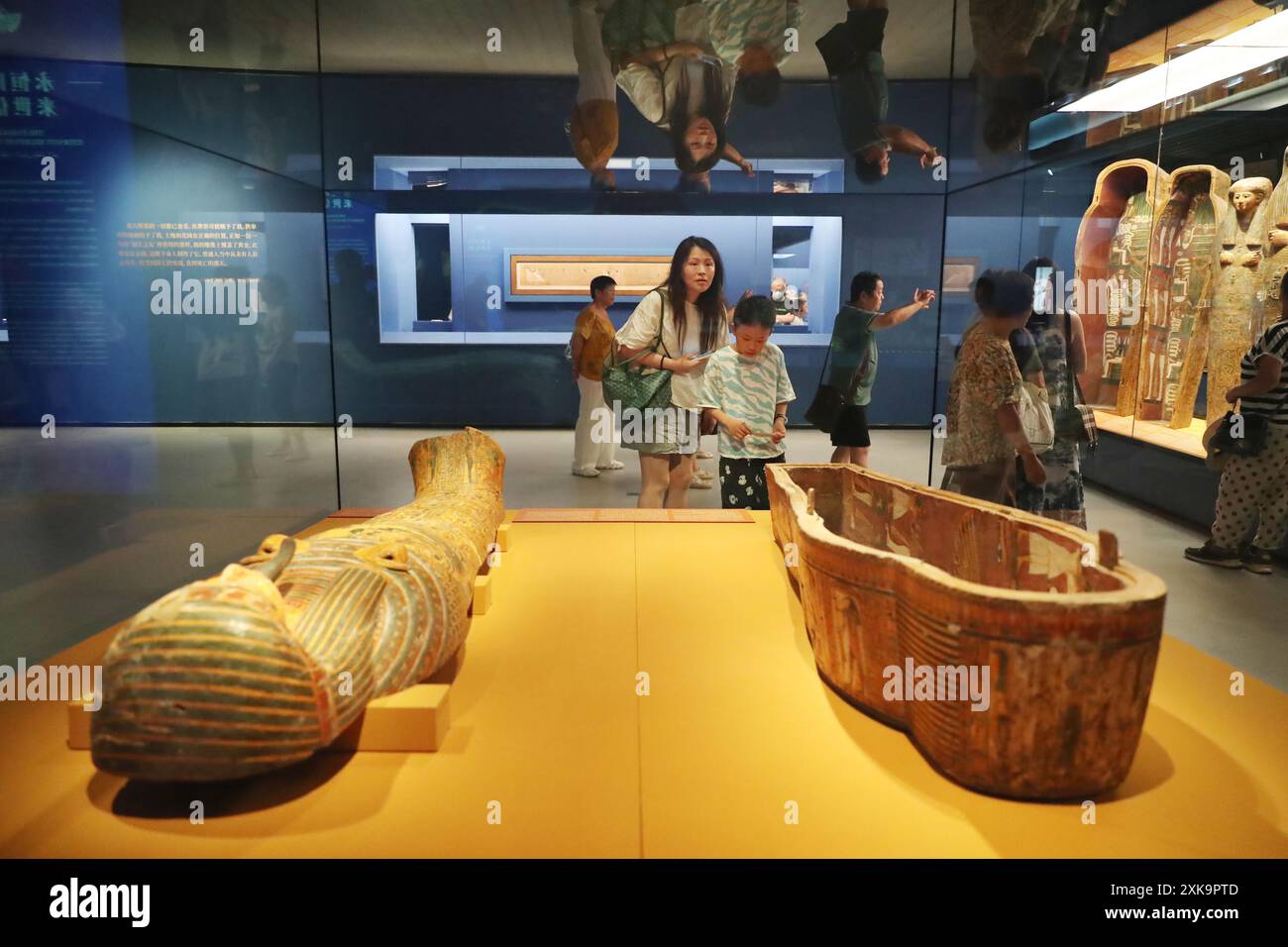 People visit the grand exhibition "On Top of the Pyramid: The ...