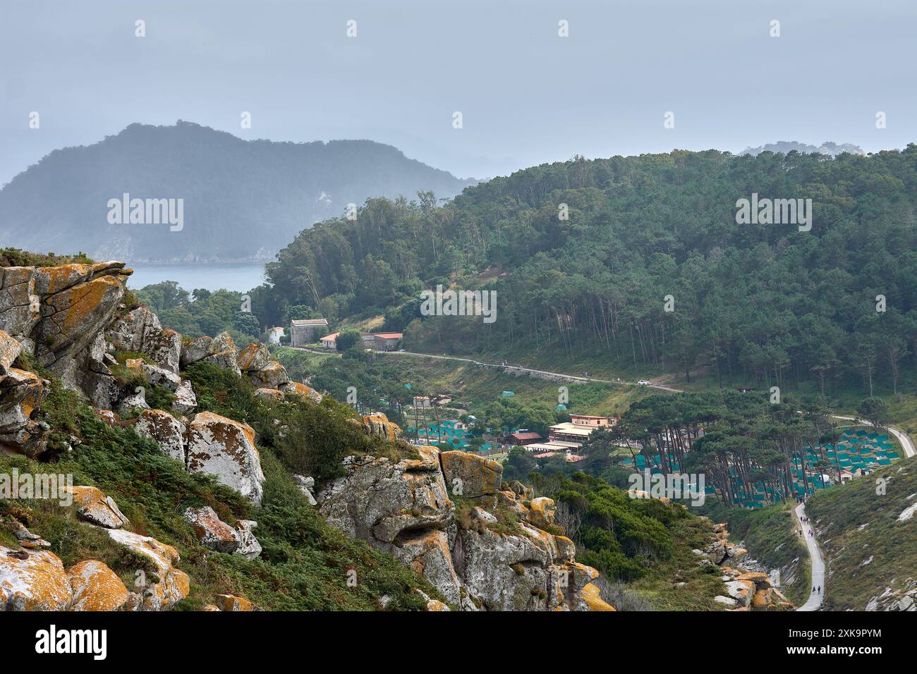 high-angle panoramic photograph captures the winding path leading up to ...