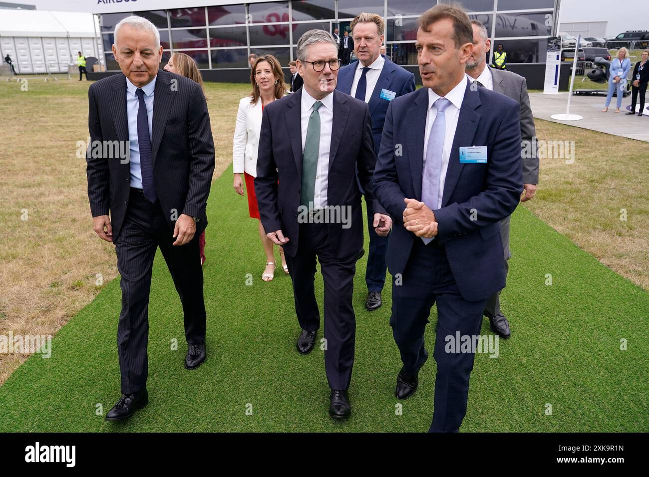 Prime Minister Sir Keir Starmer speaks to Tufan Erginbilgic (left), CEO ...