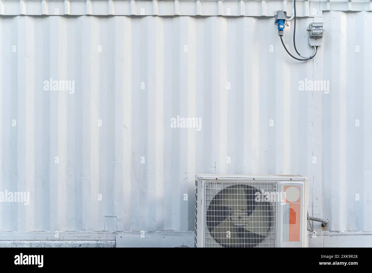 Air conditioner compressor outdoor unit installed outside the building ...