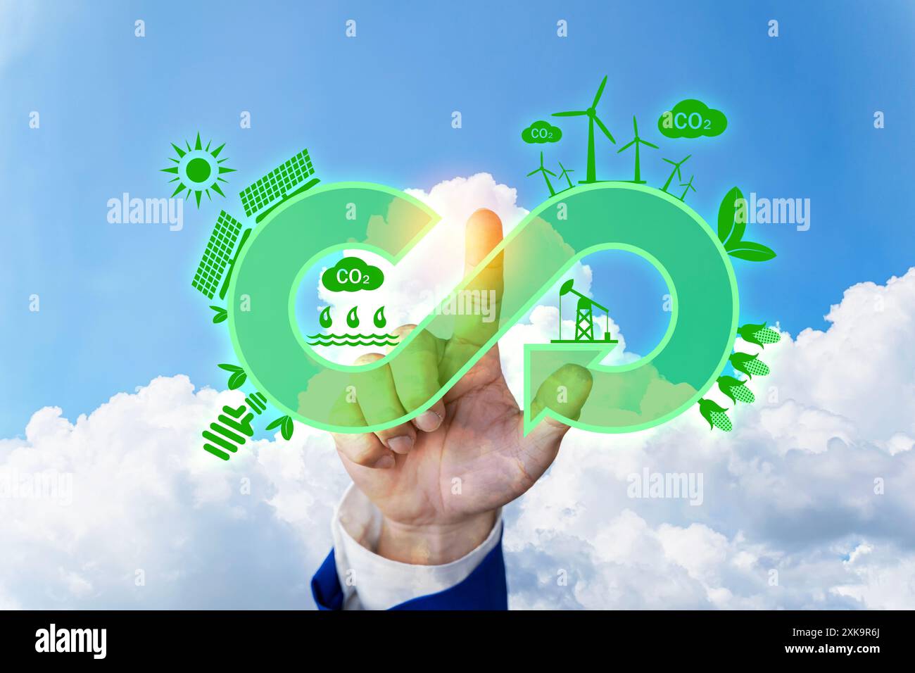 Clean energy and environmental protection. Business man touching ...