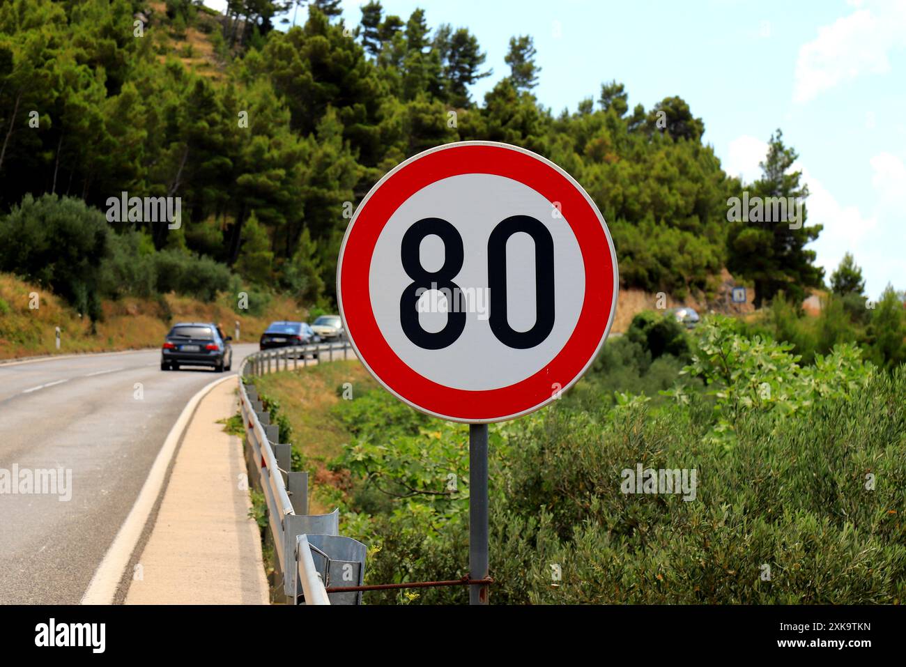 Road sign 80, speed limit 80 on a mountain road in Croatia, selective ...