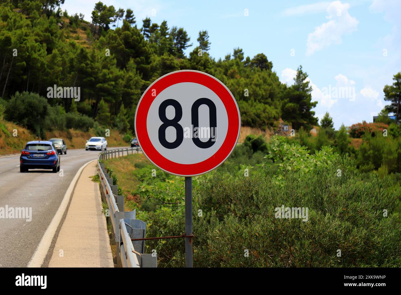 Road sign 80, speed limit 80 on a mountain road in Croatia, selective ...