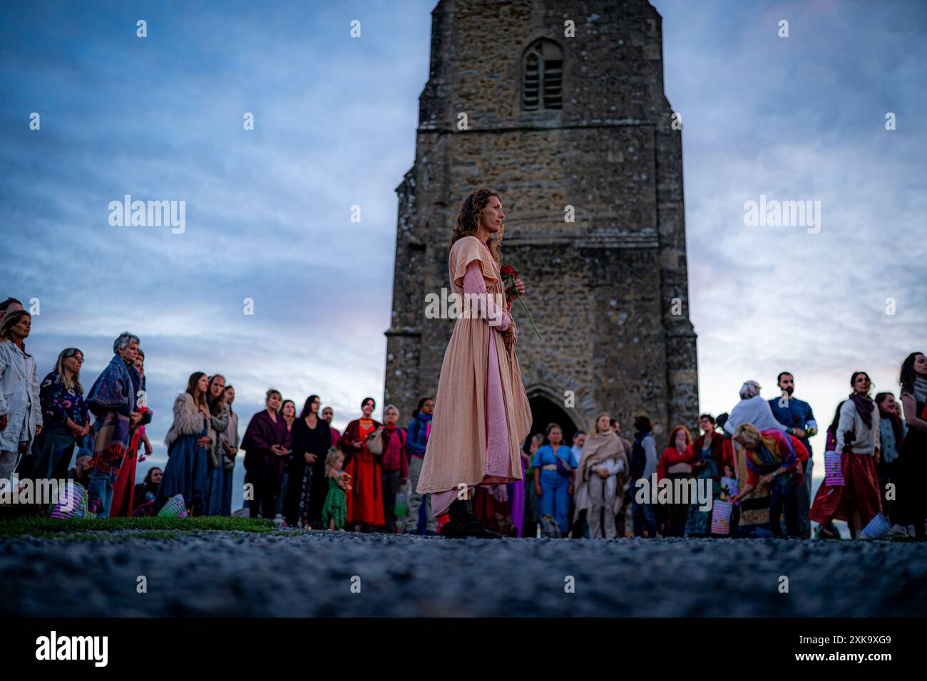 People surround Magdalene Rose Priestess, Chloe Mercer as she conducts ...