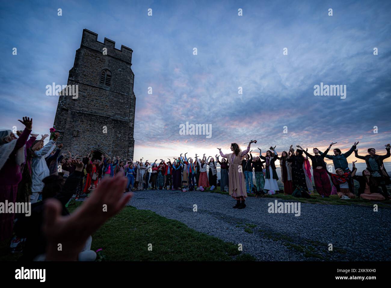 People surround Magdalene Rose Priestess, Chloe Mercer as she conducts ...