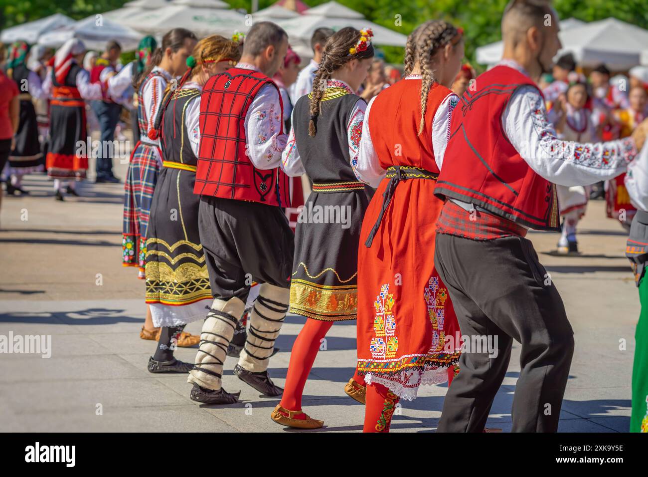 Bulgarian Folk Dancers Performing the Horo in Traditional Attire ...