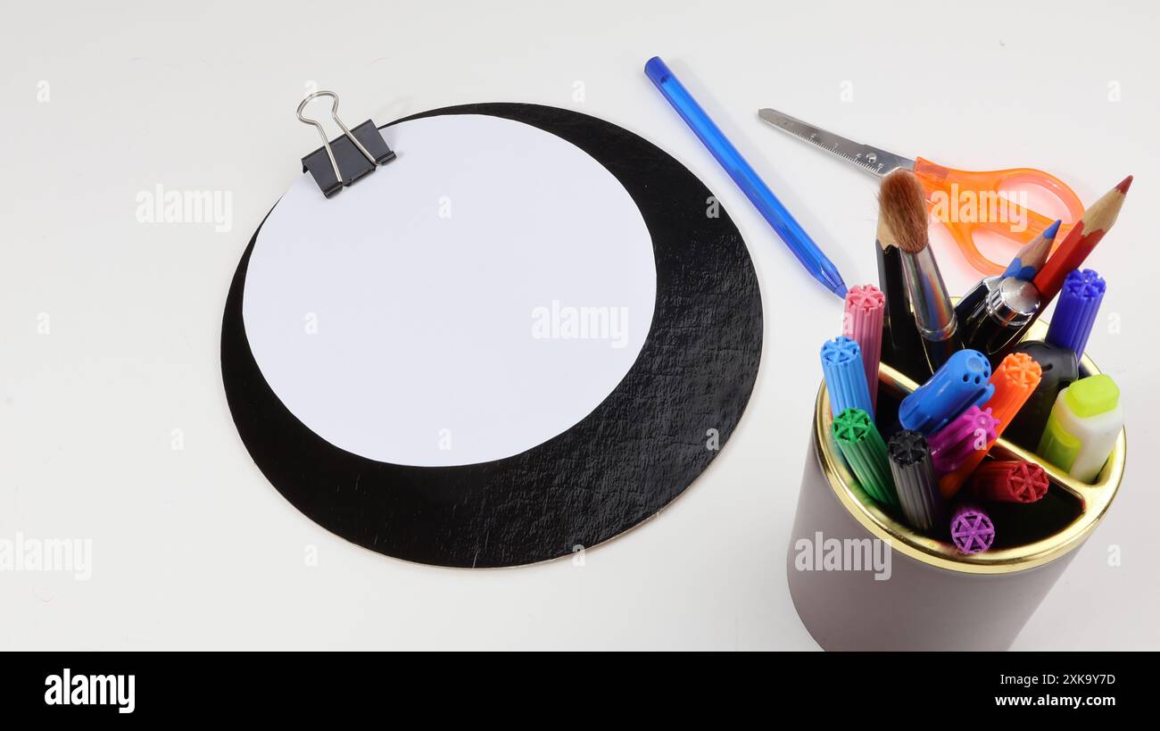 Round white color paper with white background on the desk Stock Photo ...