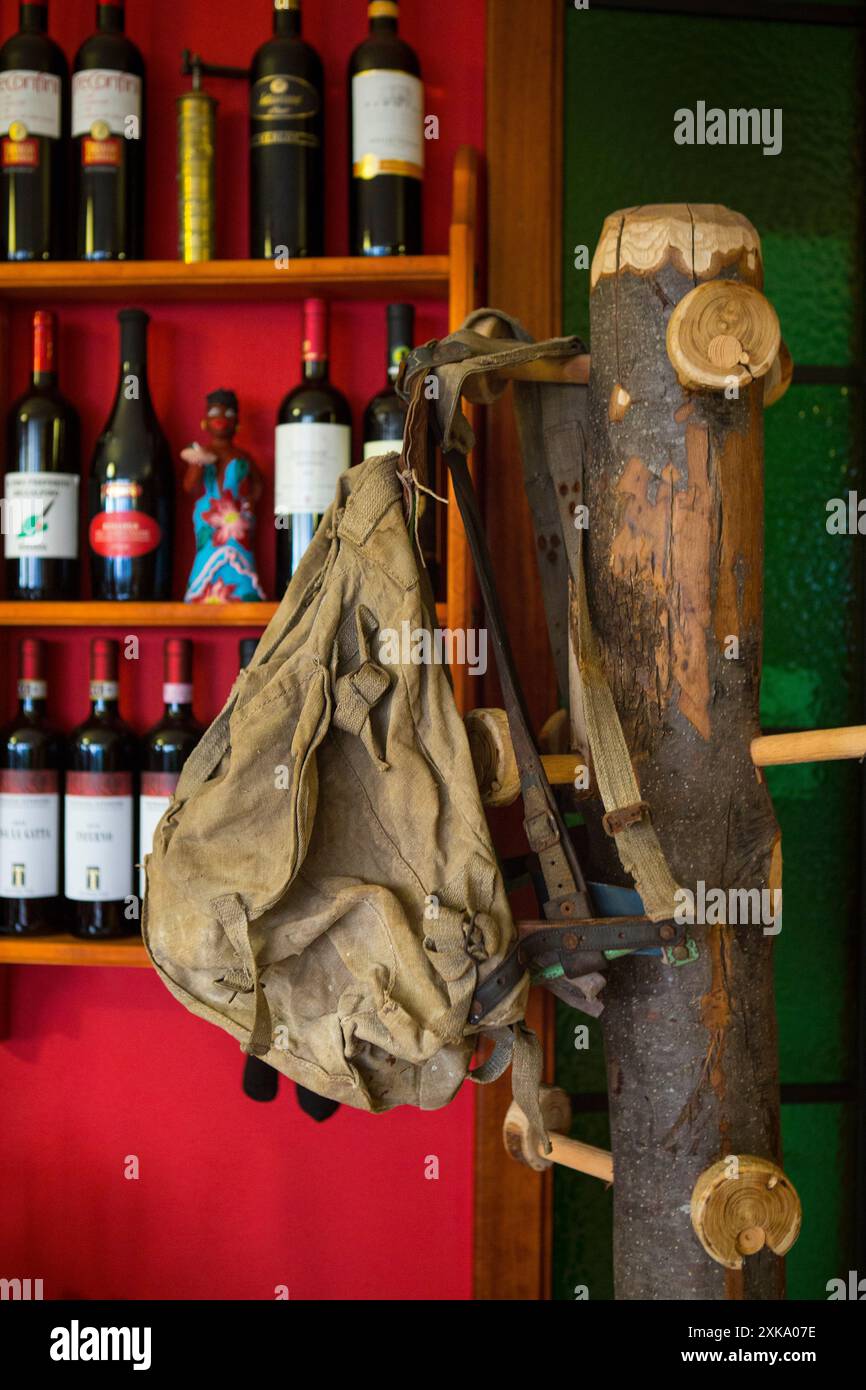 An old backpack of an hiker inside the Rifugio San Marco. Hiking the ...