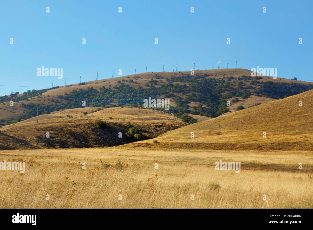 Wind mills situated on the mountain hill . Alternative fuel wind ...
